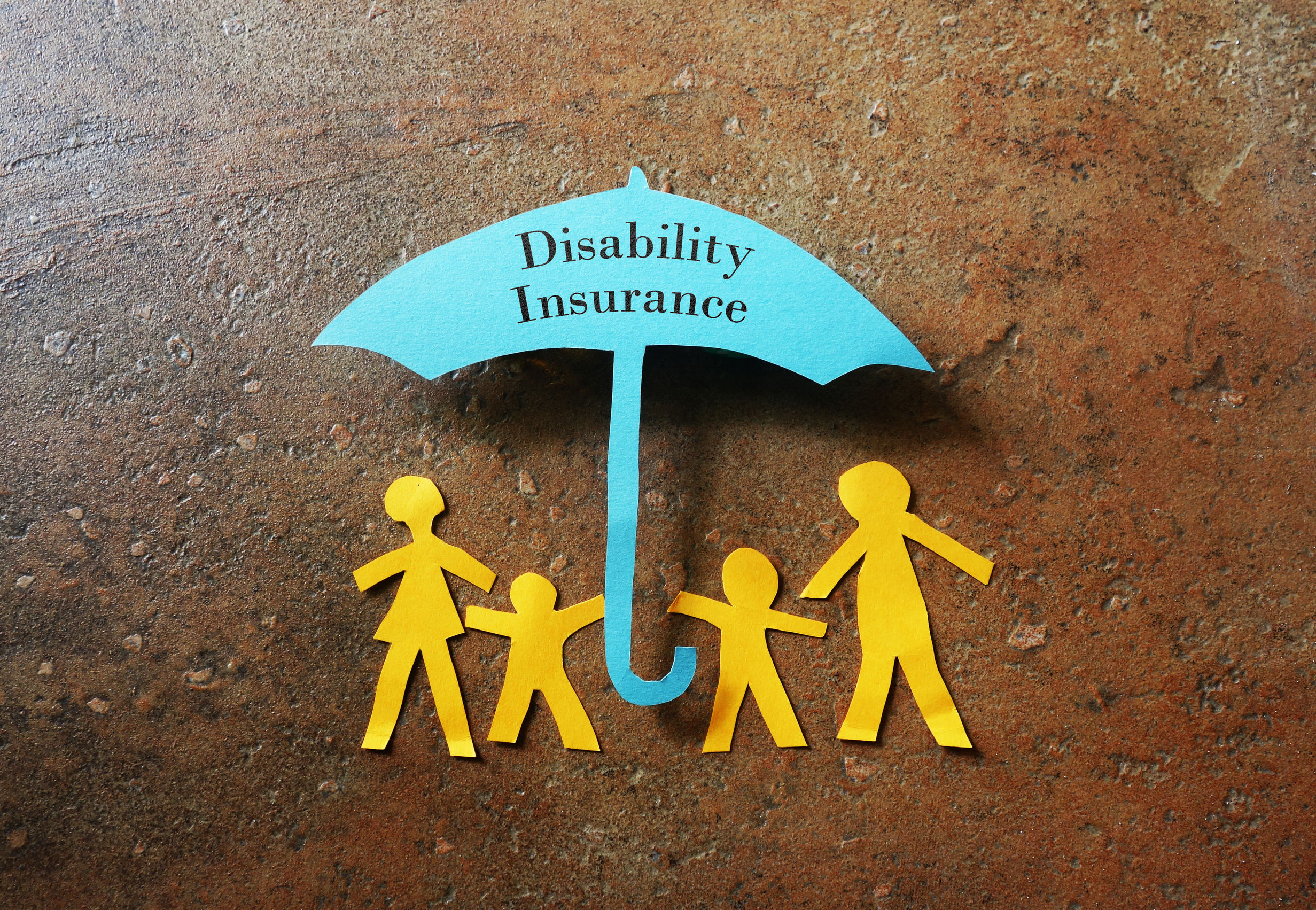 41986998 – paper family of four under a paper disability insurance ...